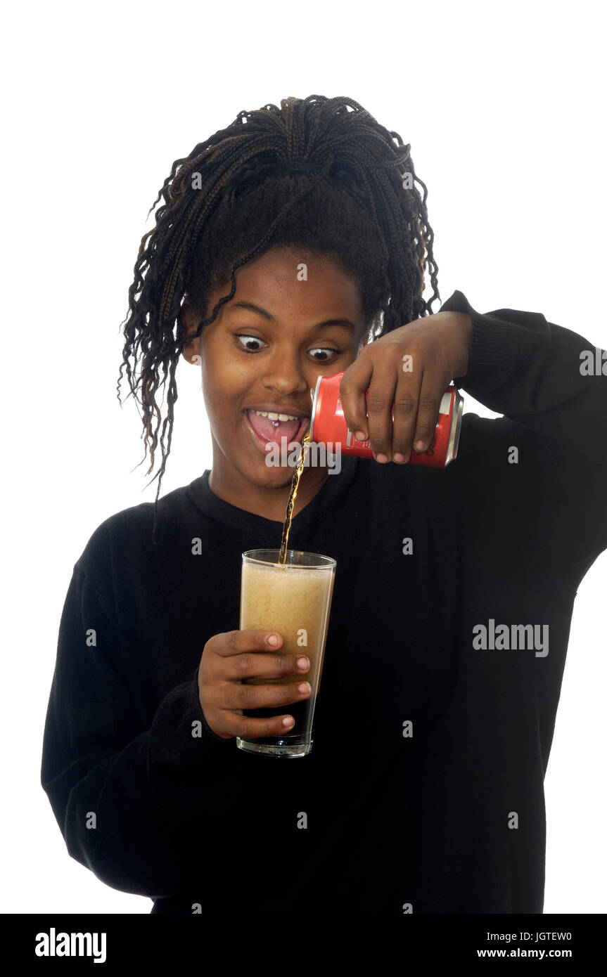 a teenage girl taking a drink coke Stock Photo - Alamy