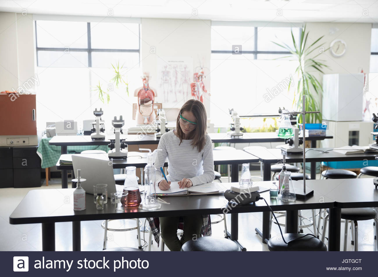 Middle school student writing hi-res stock photography and images - Alamy