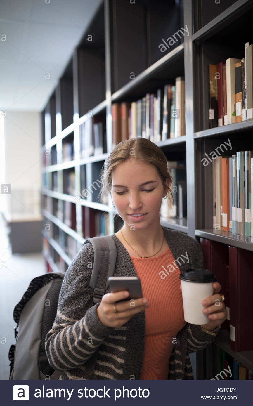 Female college student texting hi-res stock photography and images - Alamy
