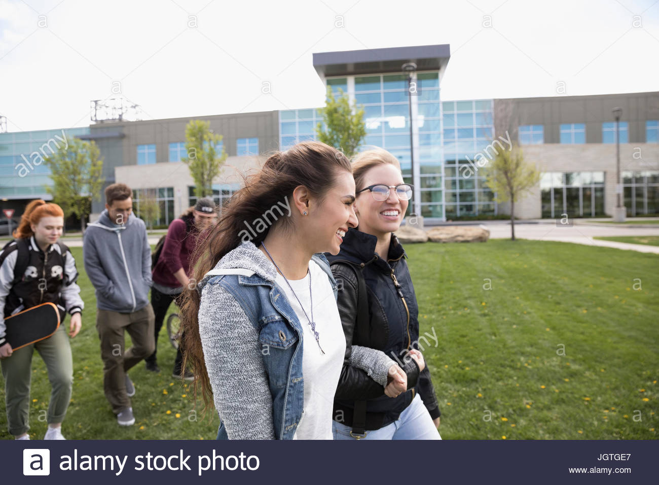 Woman walking arm hi-res stock photography and images - Alamy