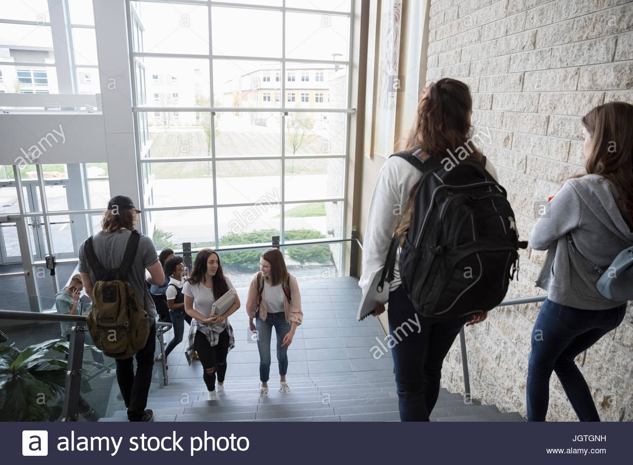 College students ascending and descending stairs Stock Photo - Alamy