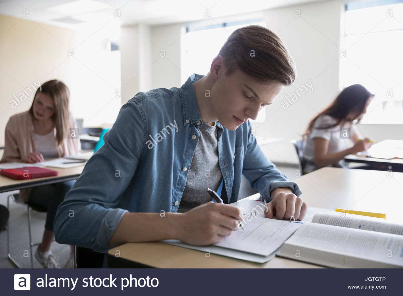 Foreground men studying hi-res stock photography and images - Alamy