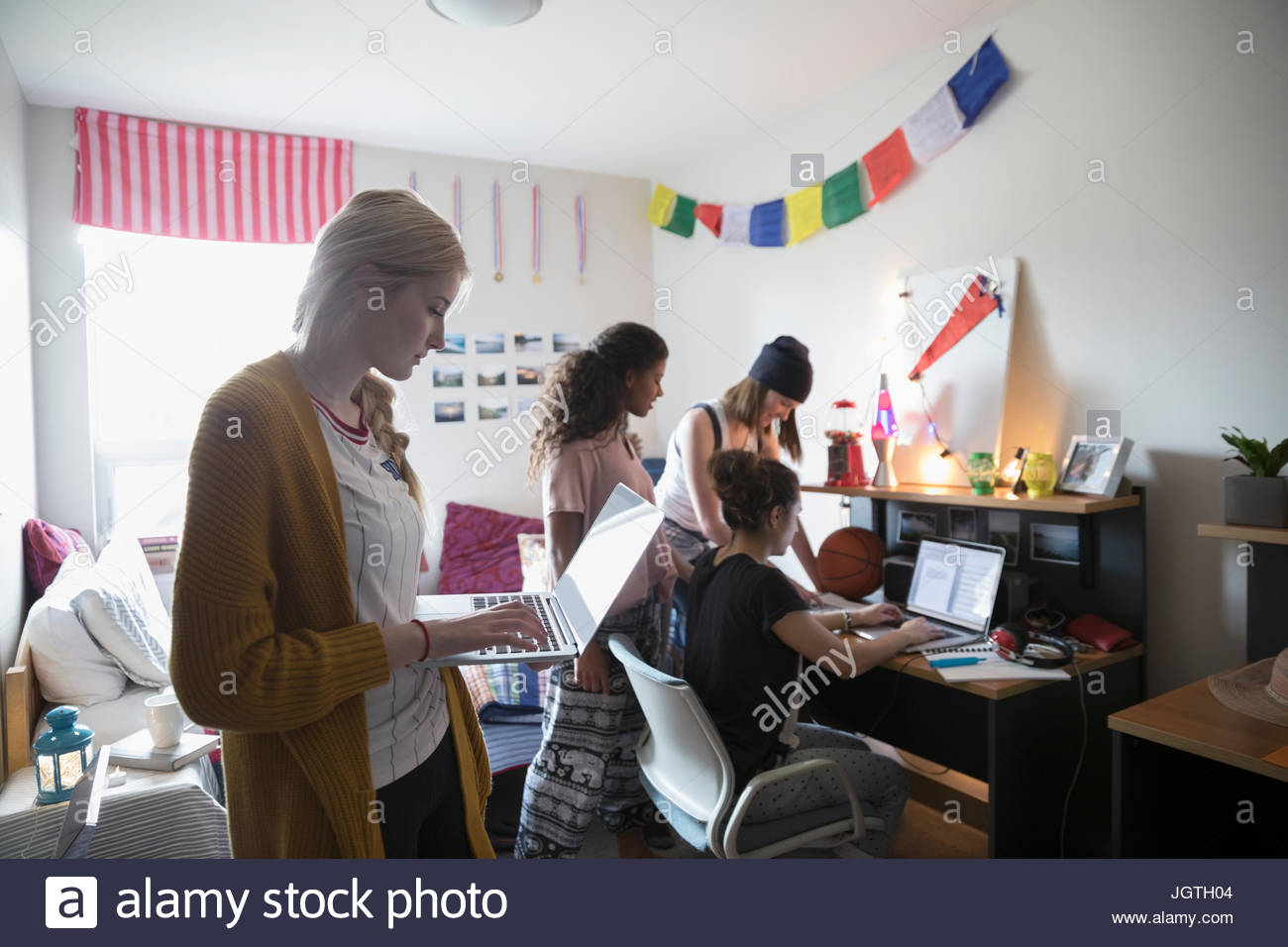 Middle eastern student holding laptop hi-res stock photography and ...