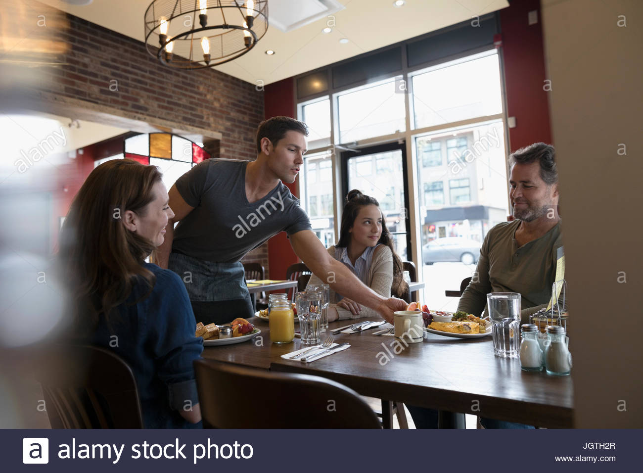 Child serving food hi-res stock photography and images - Alamy