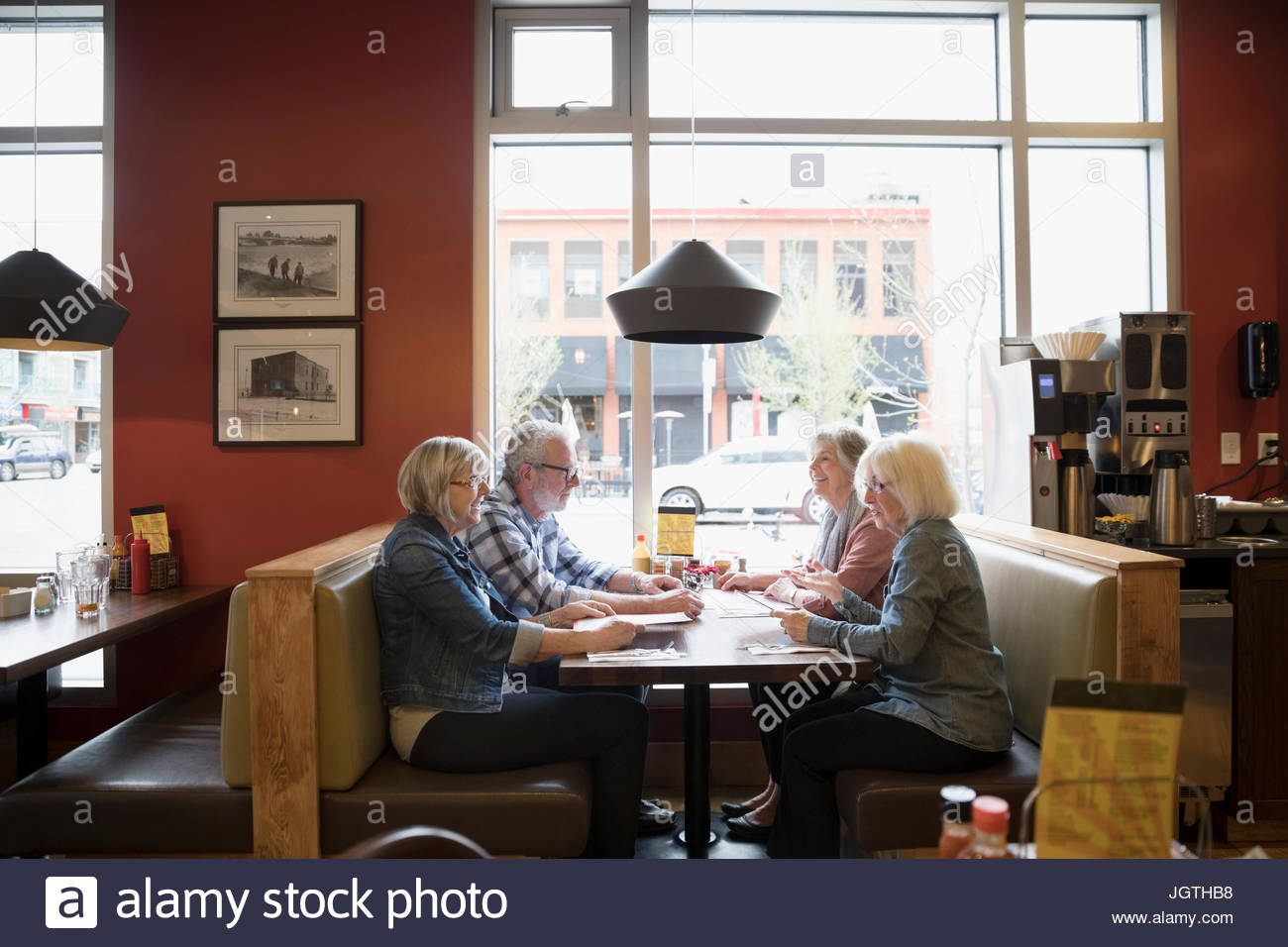 Elderly couple dining table hi-res stock photography and images - Alamy