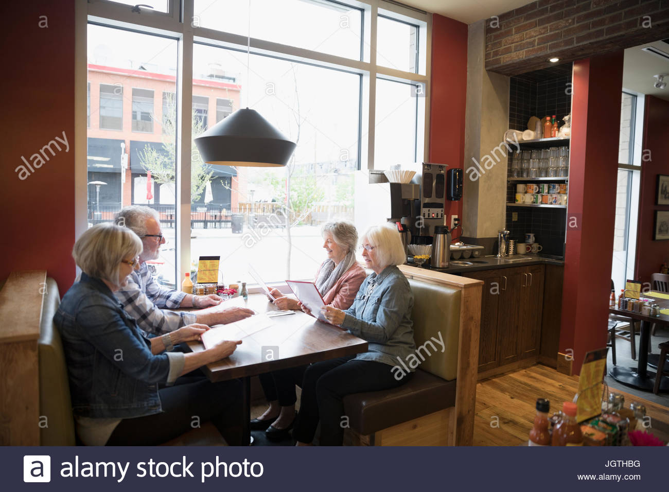 Elderly couple dining table hi-res stock photography and images - Alamy