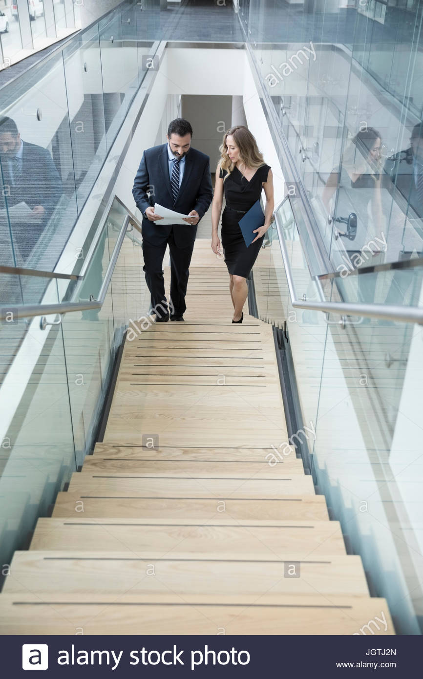 Business people ascending stairs hi-res stock photography and images ...
