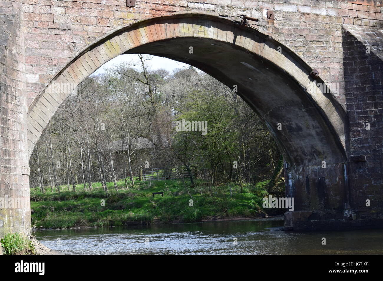 Arch over water Stock Photo - Alamy