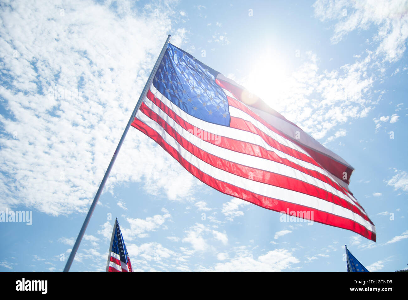 American Flags Blowing in the Wind Stock Photo - Alamy