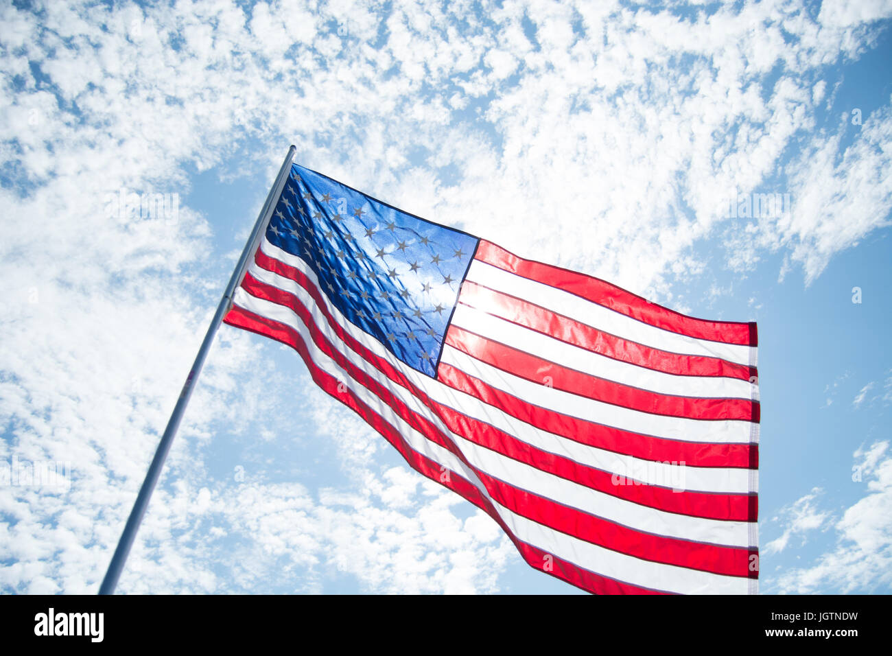 American Flags Blowing in the Wind Stock Photo - Alamy