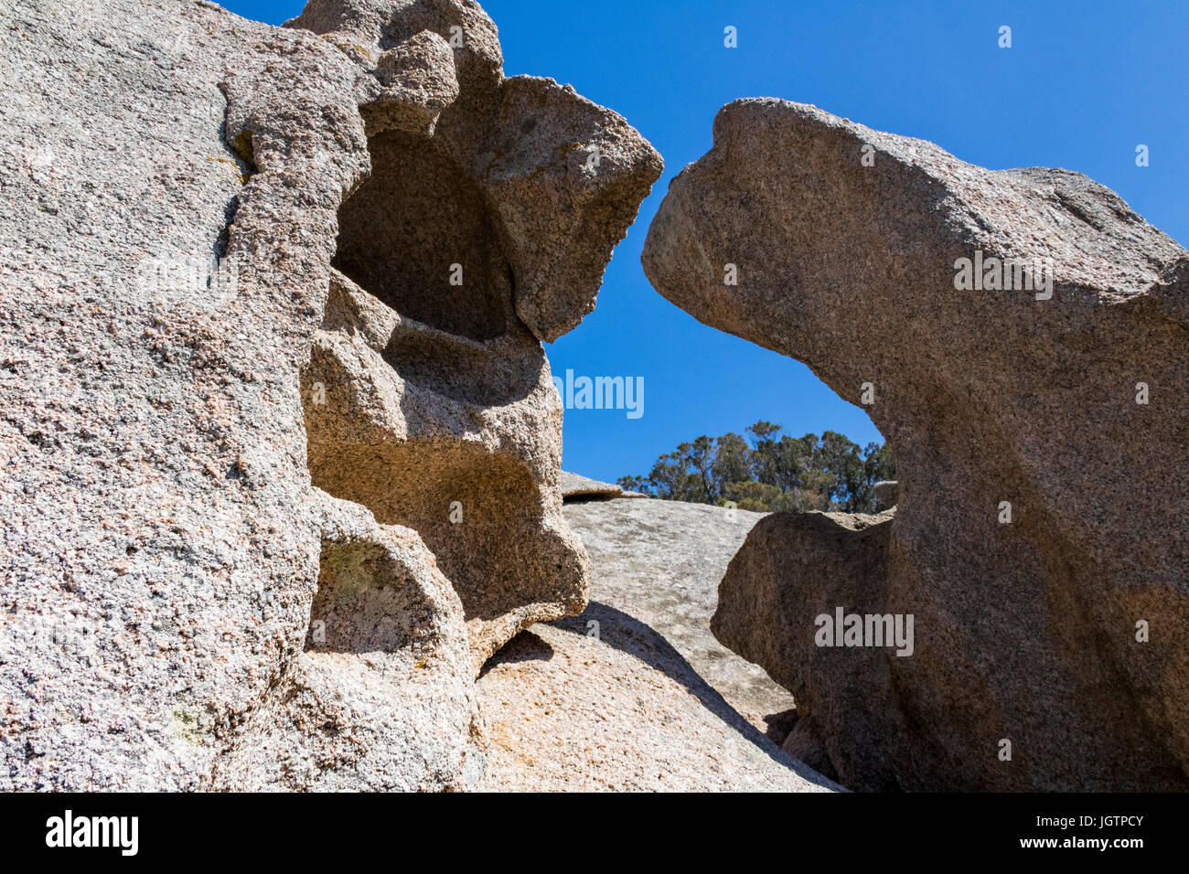 Eroded Granite Rock Formation with Plants and Blue Sky; Baia Sardinia ...