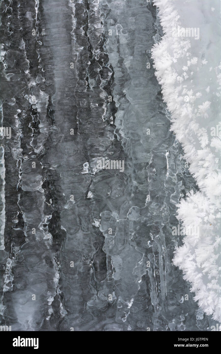Water from a spring is frozen into abstract shapes by sub-zero ...