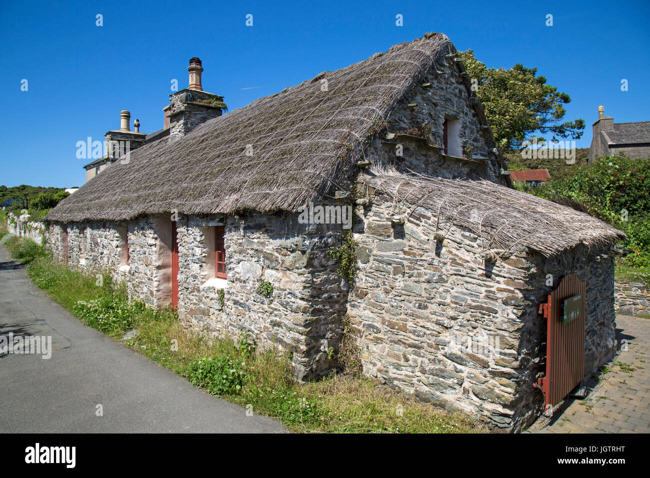 Thatched cottage in the preserved village of Cregneash on The Isle of ...