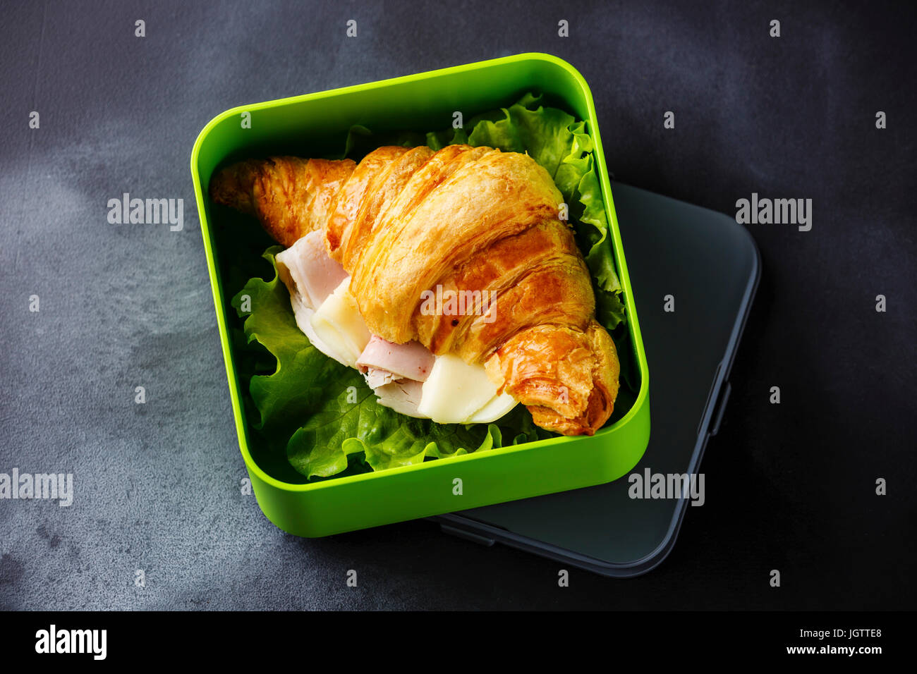 Take out food Croissant sandwich with cheese, ham and lettuce in Lunch ...