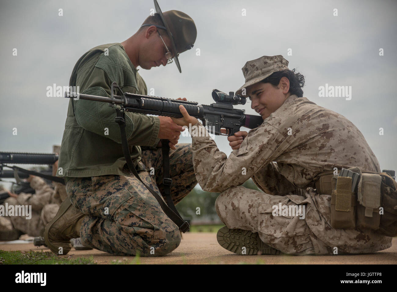 U.S. Marine Corps Sgt. Nicholas A. McCalley, a marksmanship trainer ...