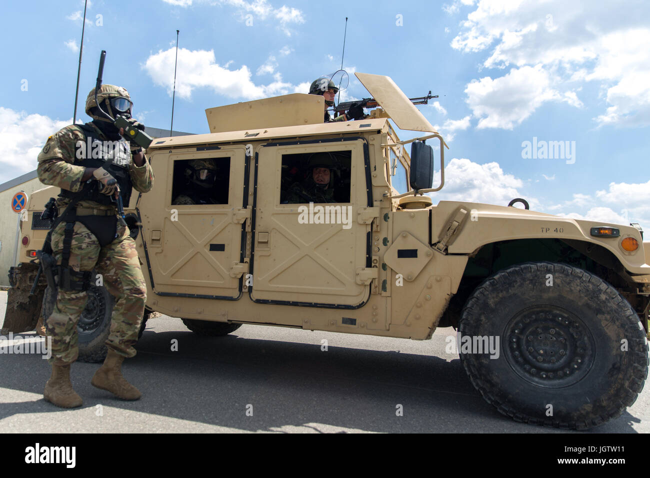 [U.S. Army or Other Nation army] [Rank Name] of [Unit] [describe action ...