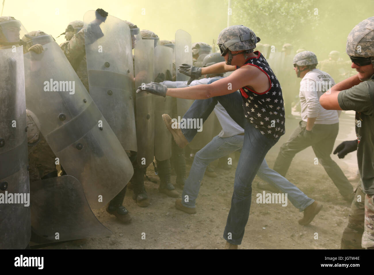U.S. Soldiers of 1st Battalion, 4th Infantry Regiment attempt to breach ...