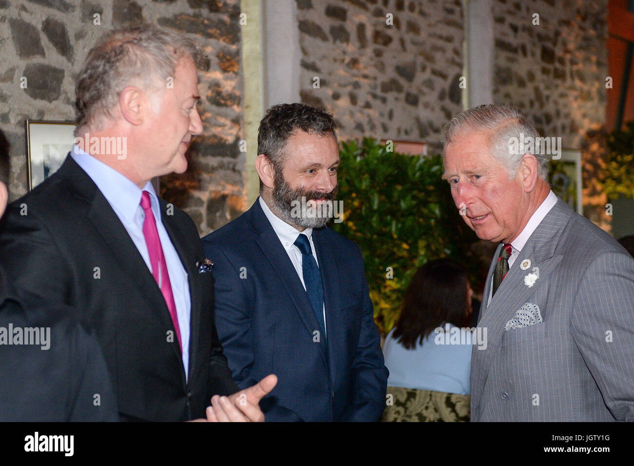Owen Teale (left), and Michael Sheen greet the Prince of Wales at his ...