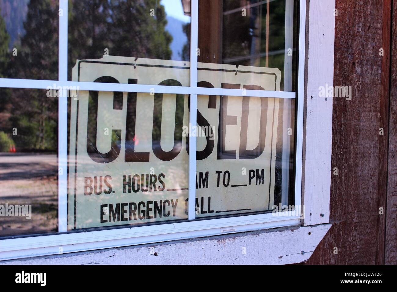 Closed sign in window Stock Photo - Alamy