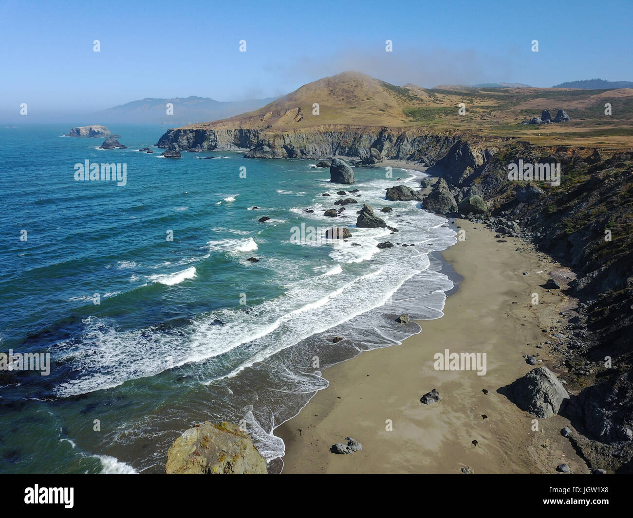 The Pacific Ocean washes against the scenic coast of northern ...