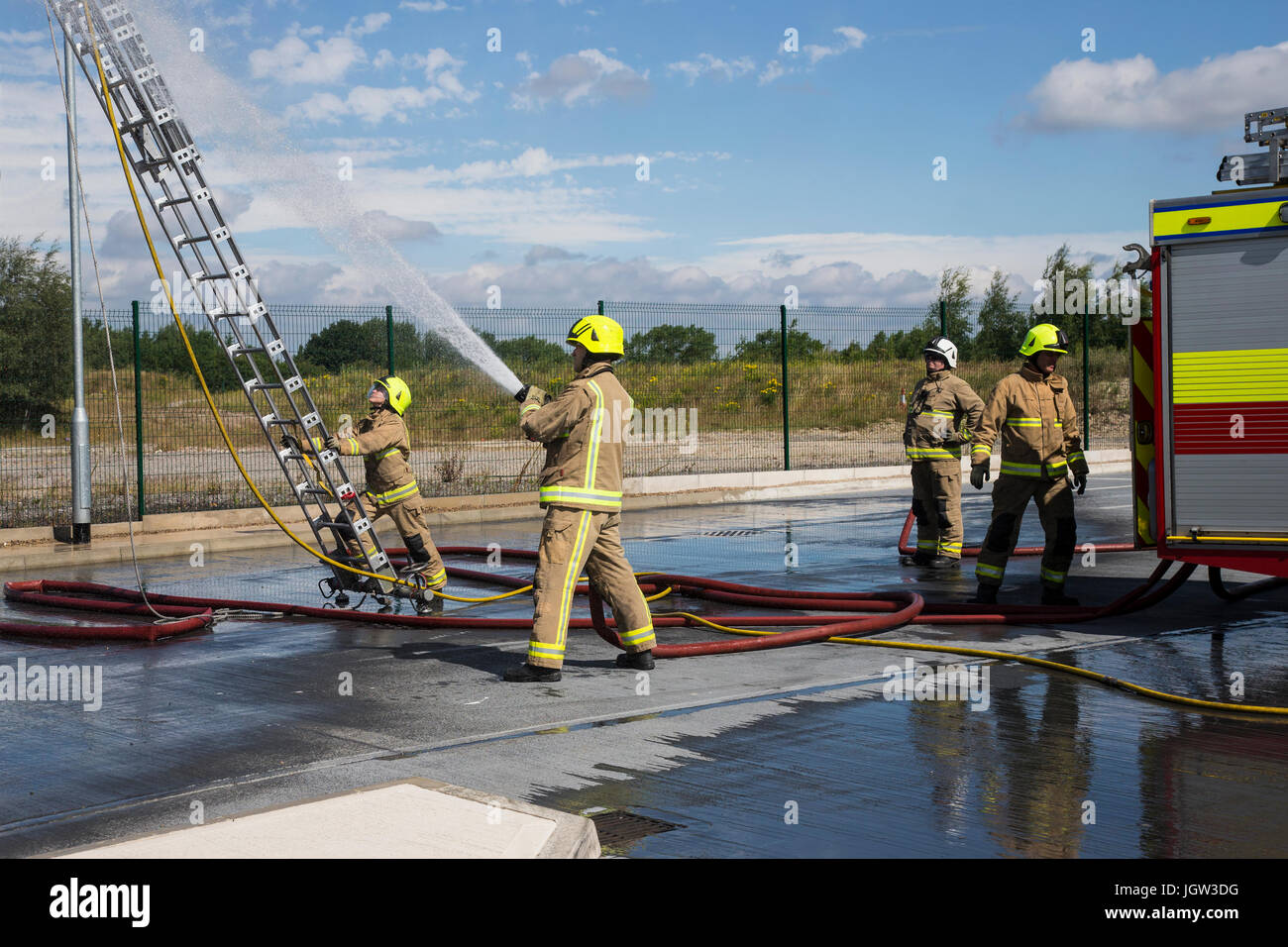 Firefighters training at a UK fire station Stock Photo - Alamy