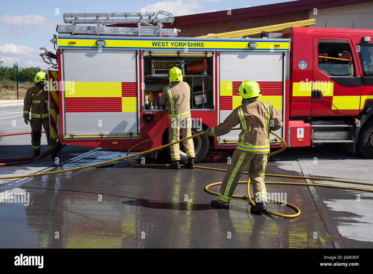 Firefighters training at a UK fire station Stock Photo - Alamy