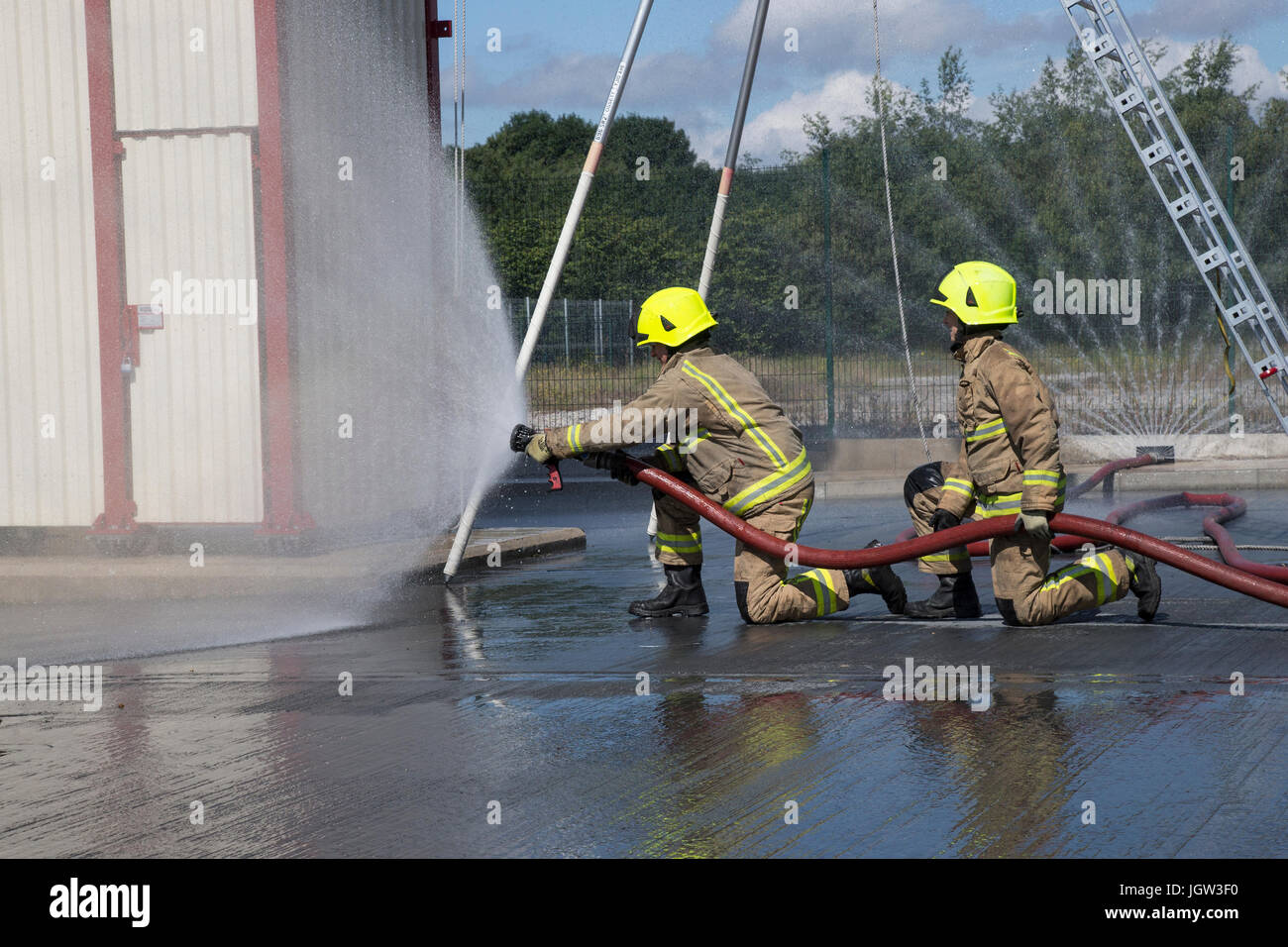 Firefighters training at a UK fire station Stock Photo - Alamy