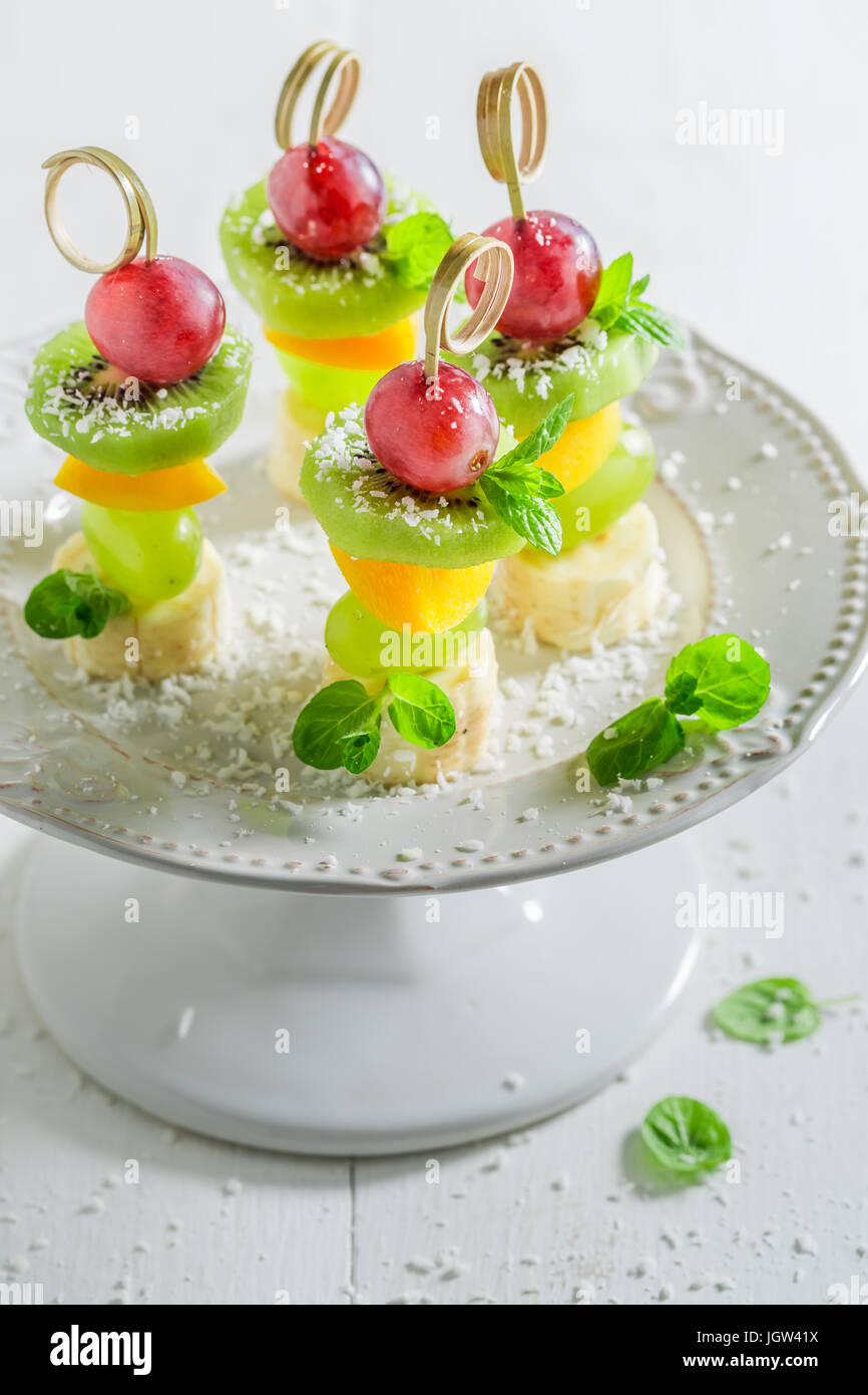 Closeup of finger food with fruits and mint for party Stock Photo - Alamy
