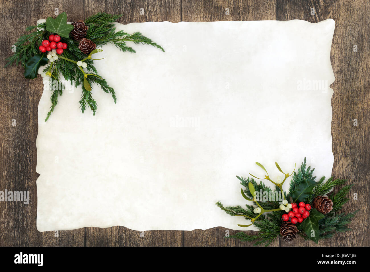 Old fashioned christmas background border with holly, mistletoe, ivy ...