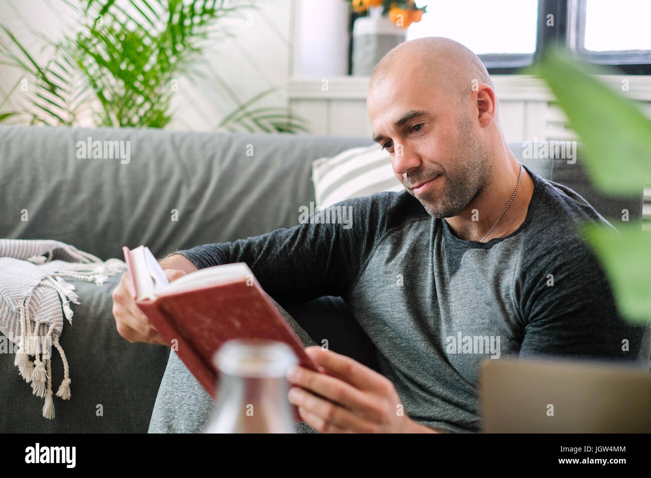 Lifestyle. Handsome man at home Stock Photo - Alamy