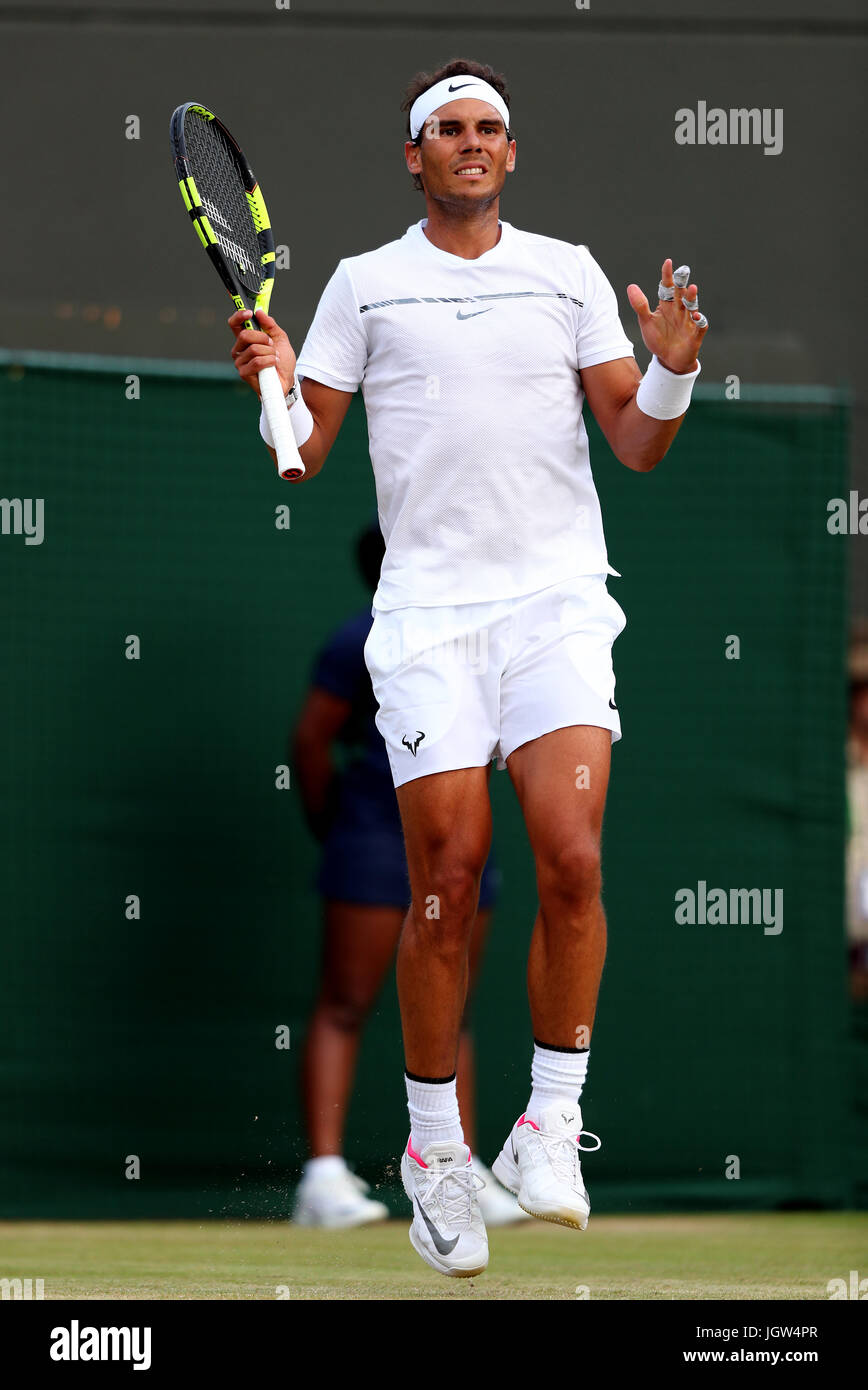 Rafael Nadal reacts during his match against Gilles Muller on day seven ...