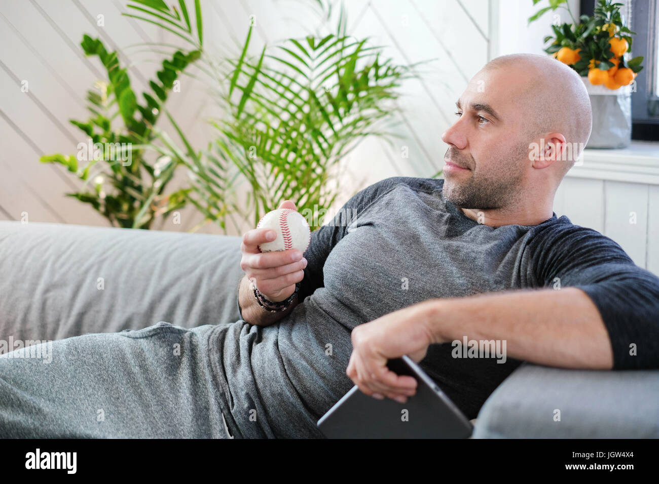 Lifestyle. Handsome man at home Stock Photo - Alamy