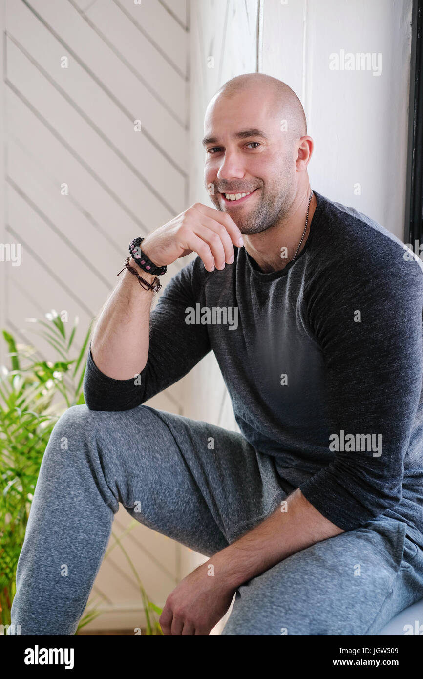Lifestyle. Handsome man at home Stock Photo - Alamy