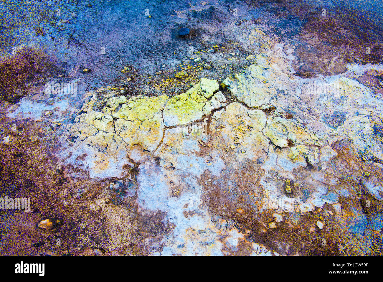 Cracked mud texture from geothermal gas on the ground Stock Photo - Alamy