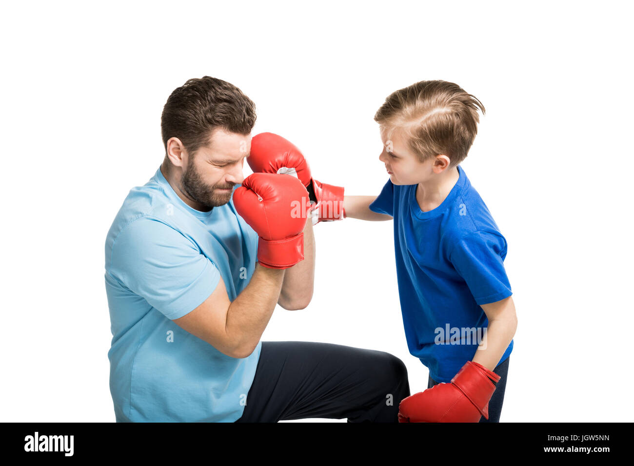 Father with son during boxing training isolated on white Stock Photo ...