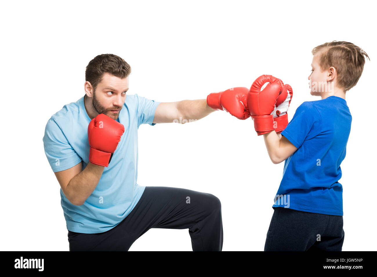 Happy father with son during boxing training isolated on white Stock ...