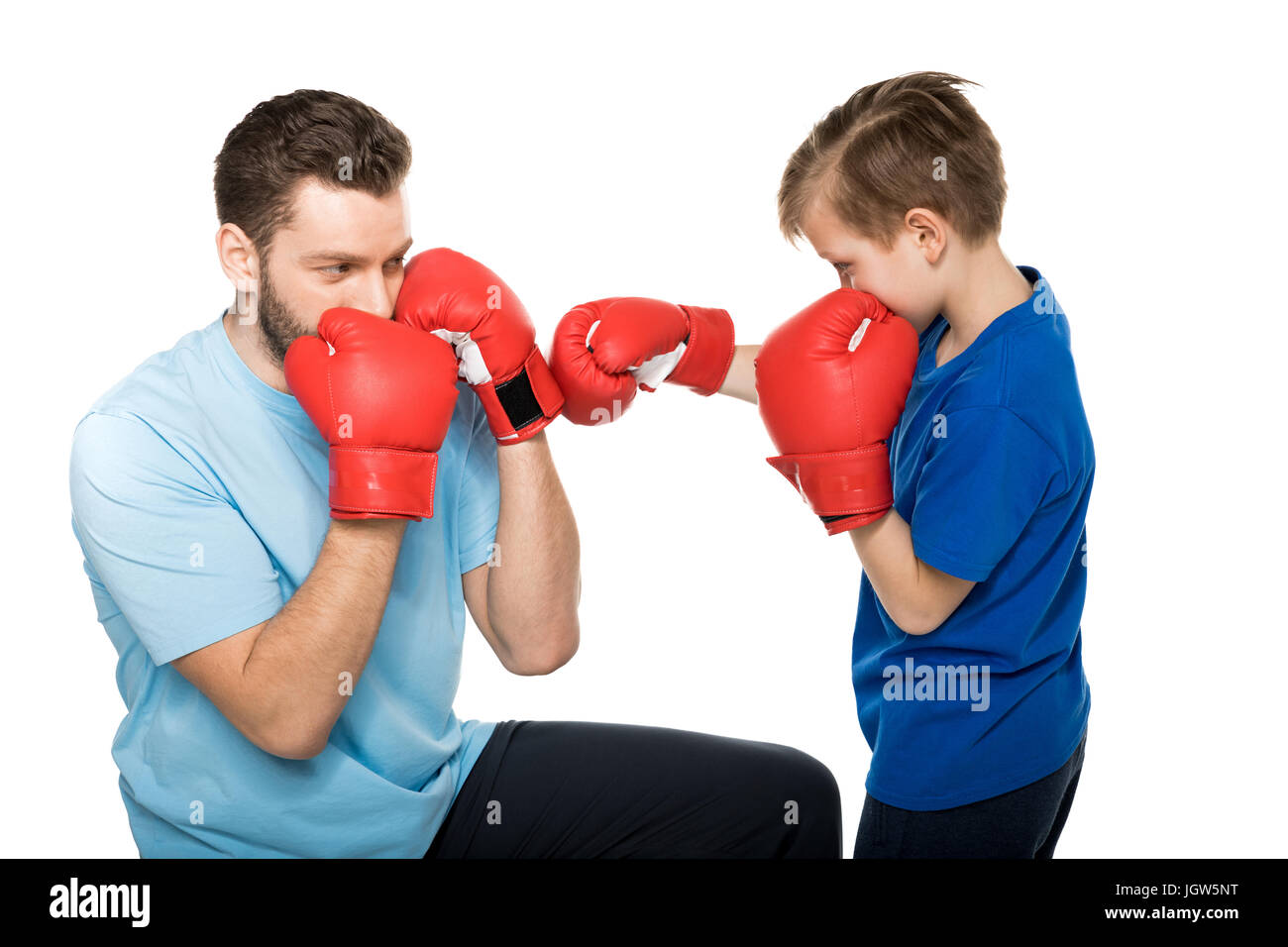 Happy father with son during boxing training isolated on white Stock ...