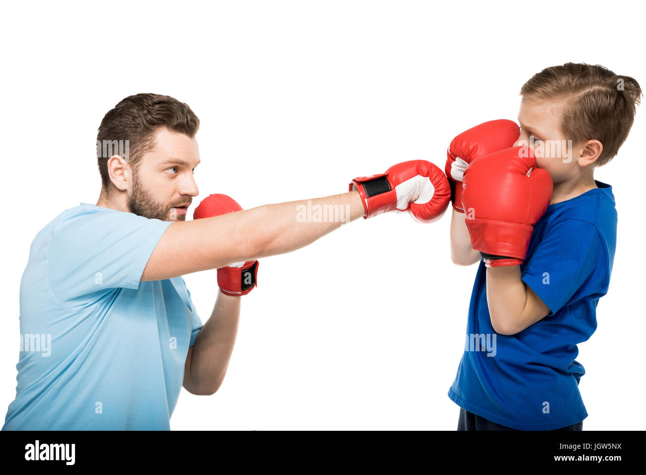 Happy father with son during boxing training isolated on white Stock ...