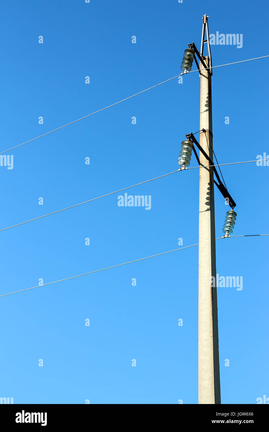 Pillar with power line Stock Photo - Alamy