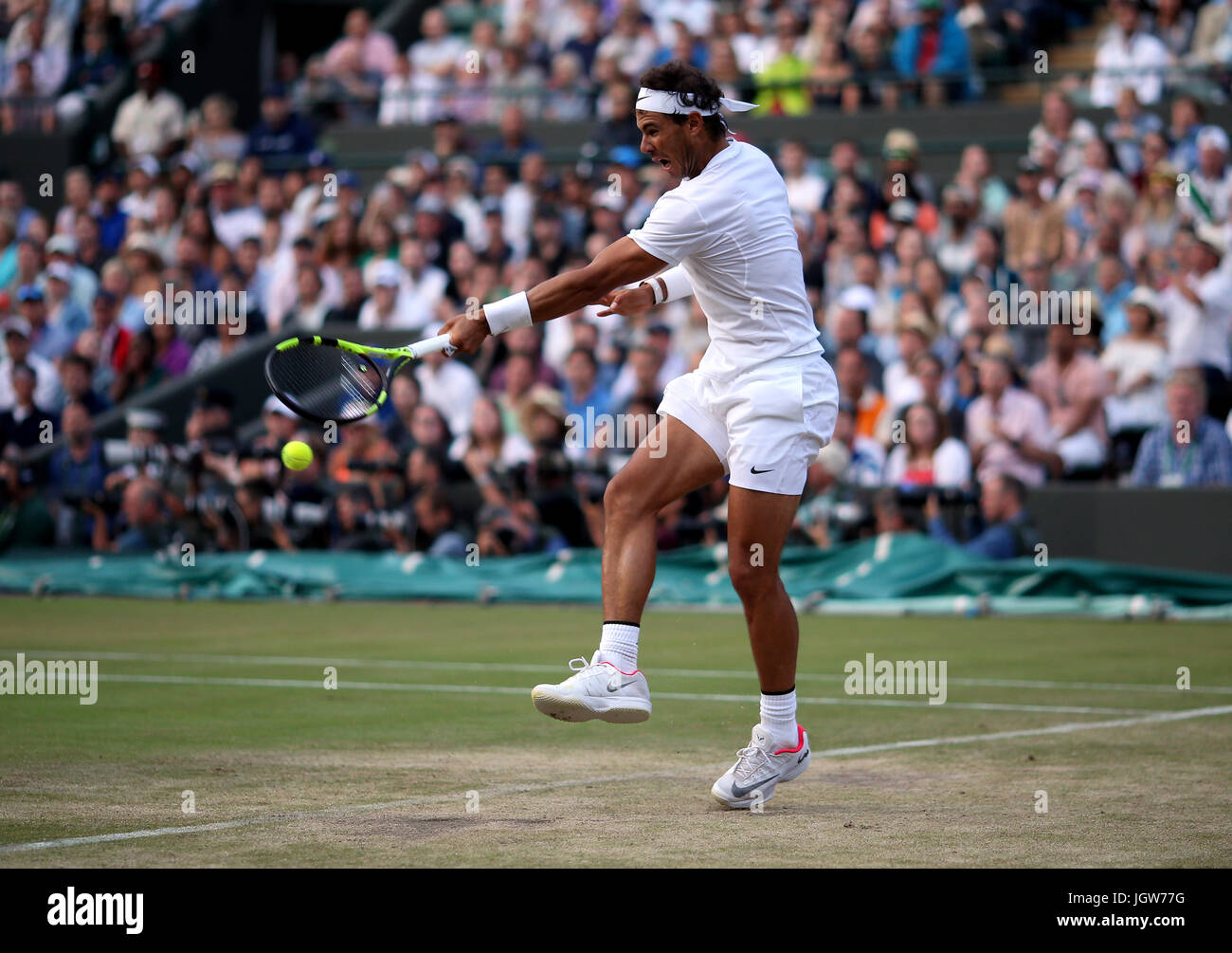 Rafael Nadal in action against Gilles Muller on day seven of the ...