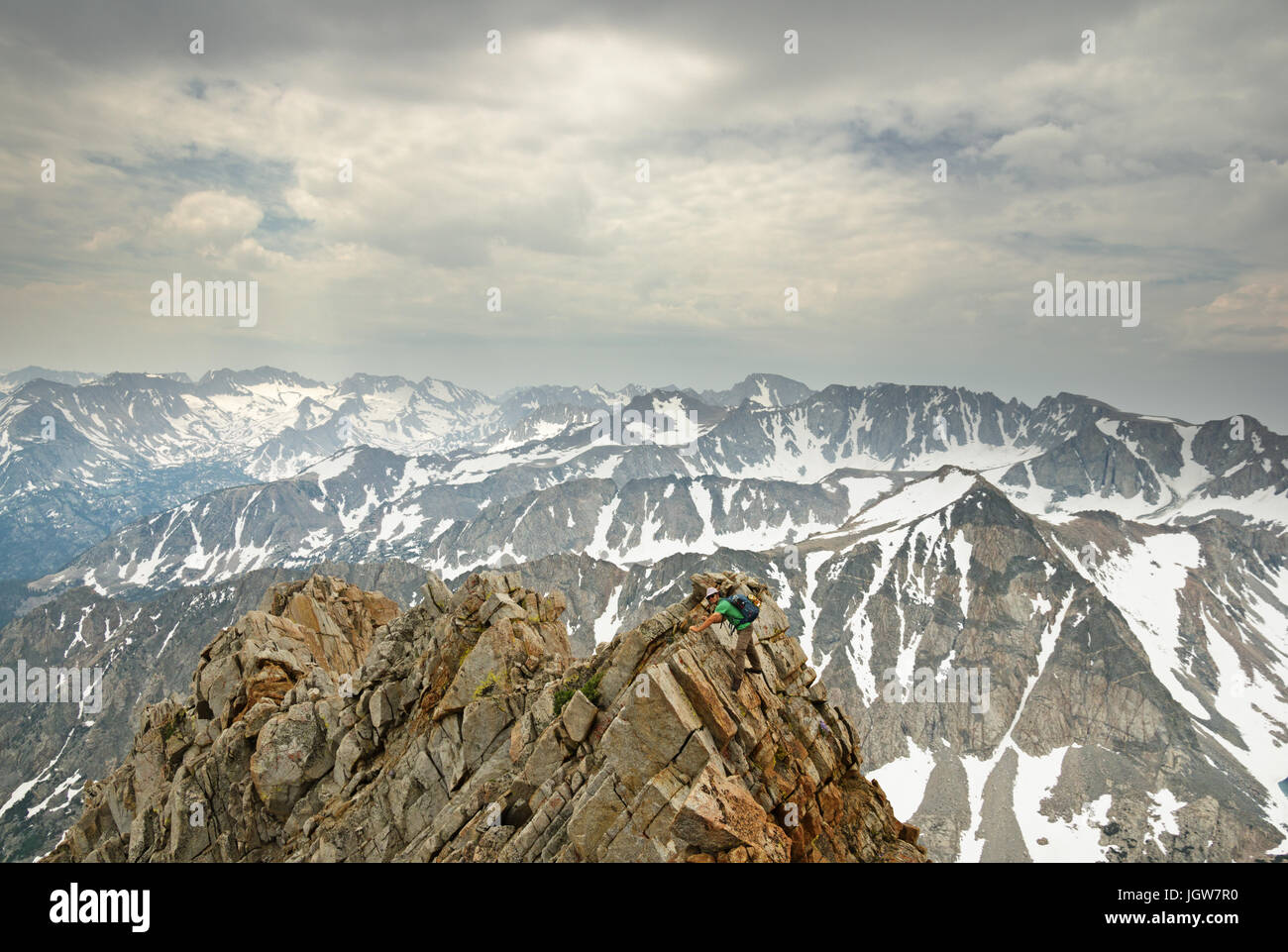 a man in the distance climbing the ridge of Mount Emerson in the Sierra ...