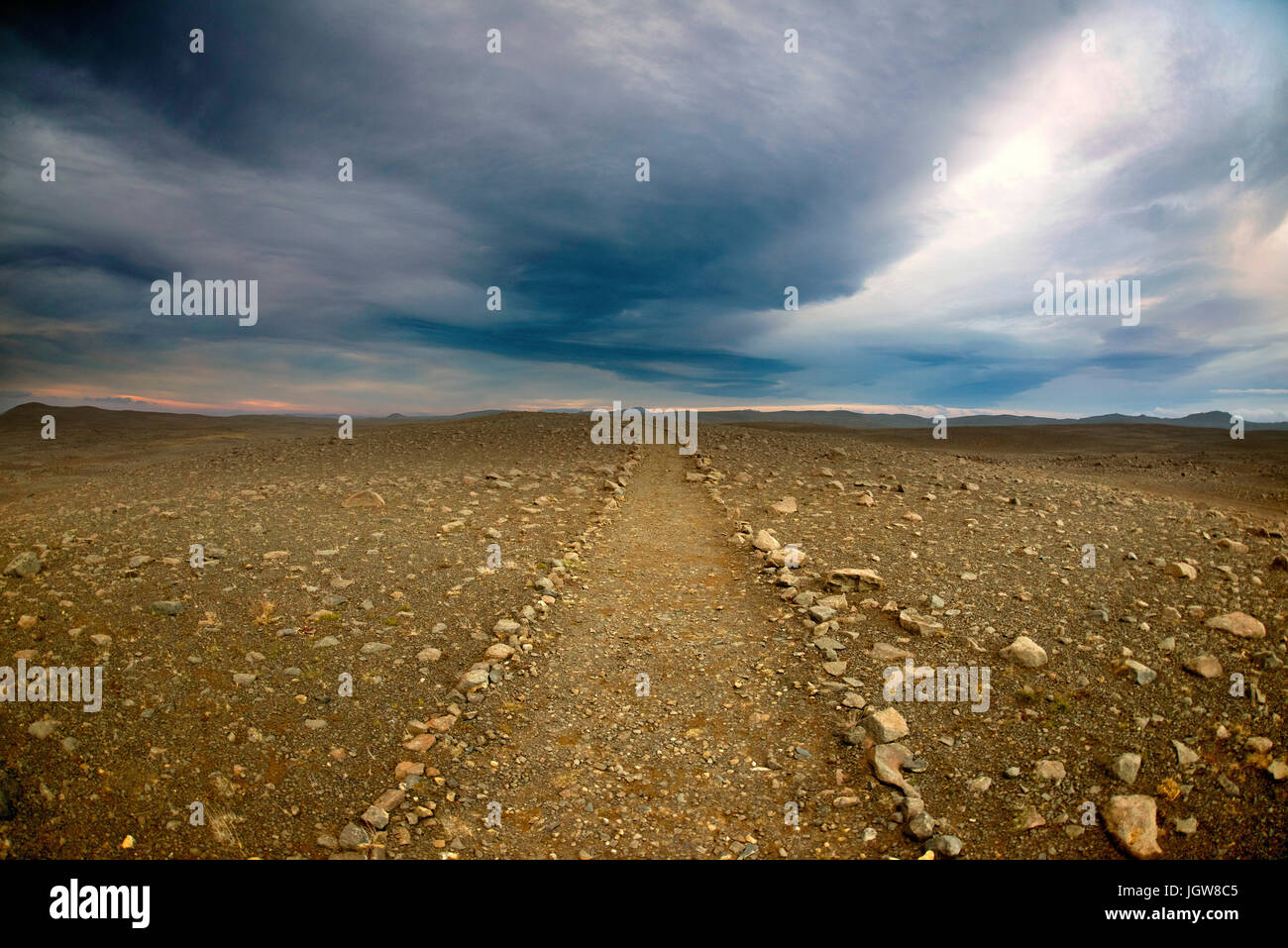 Volcanic Rock Path to the horizon Stock Photo - Alamy
