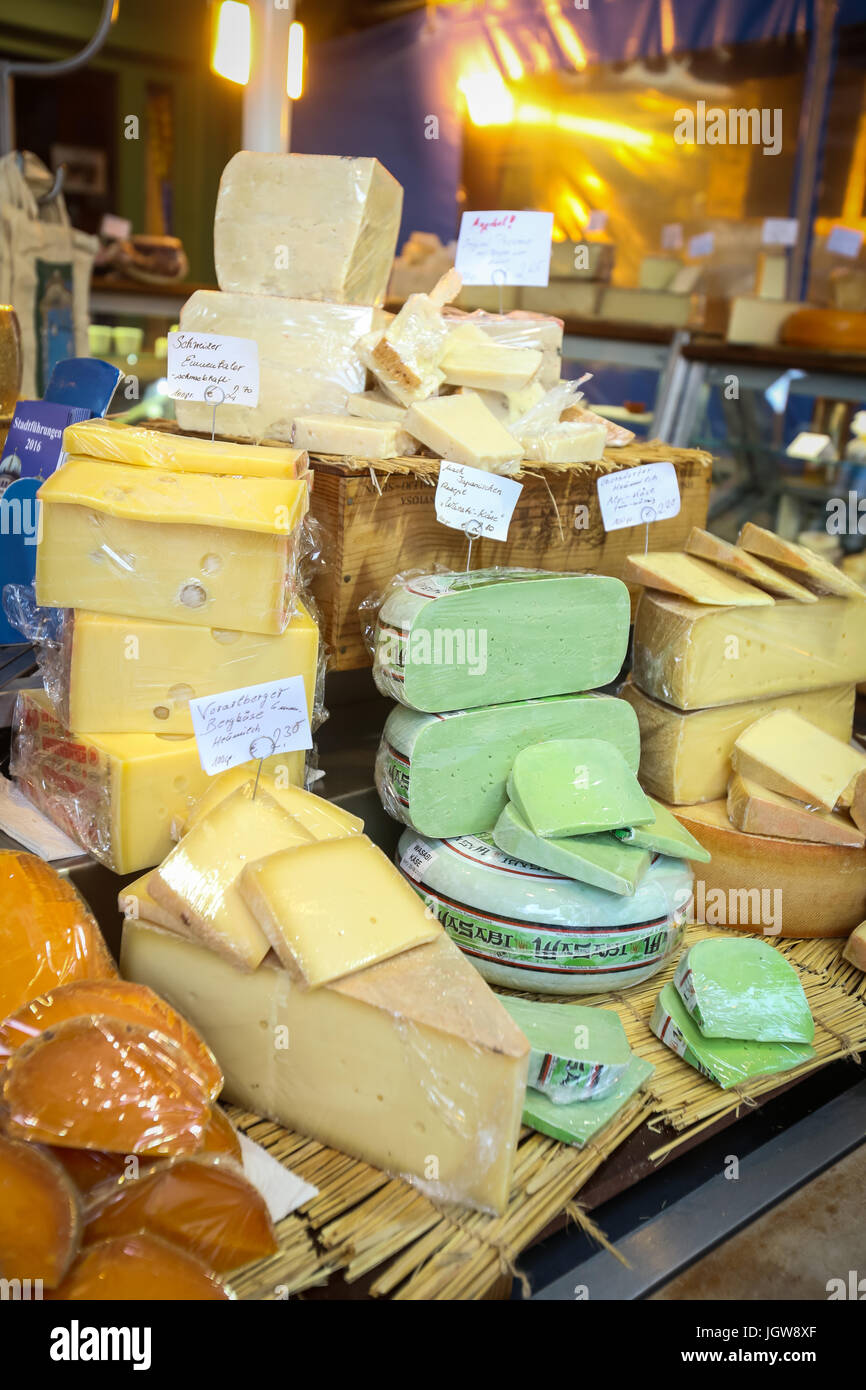 MUNICH, GERMANY - MAY 9, 2017 : Different kinds of cheese displayed at ...