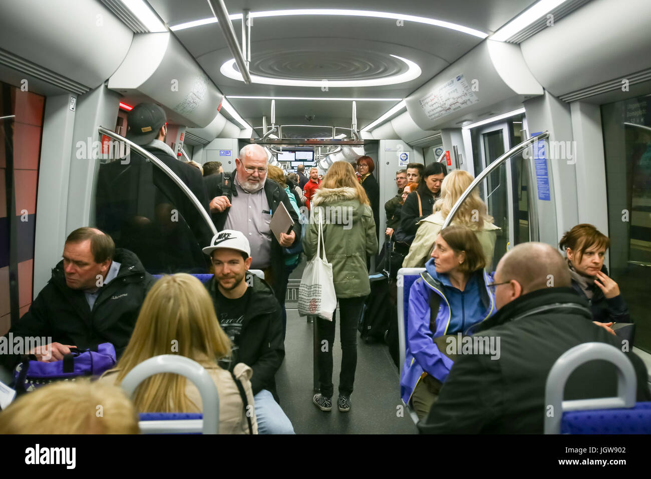 Train people traveling standing sitting hi-res stock photography and ...