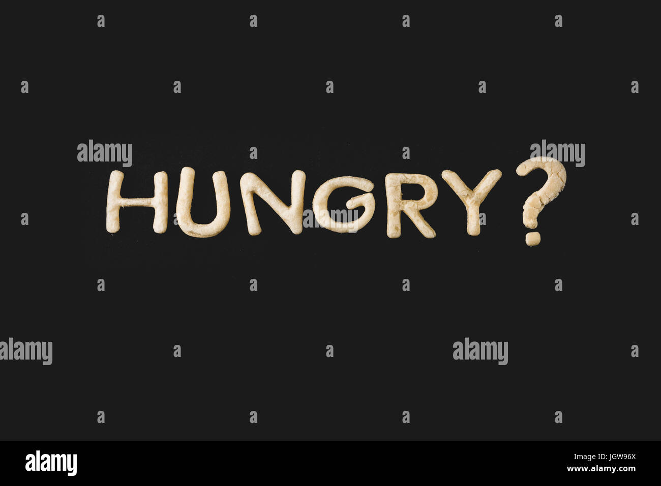 top view of word hungry made from cookie dough isolated on black Stock ...