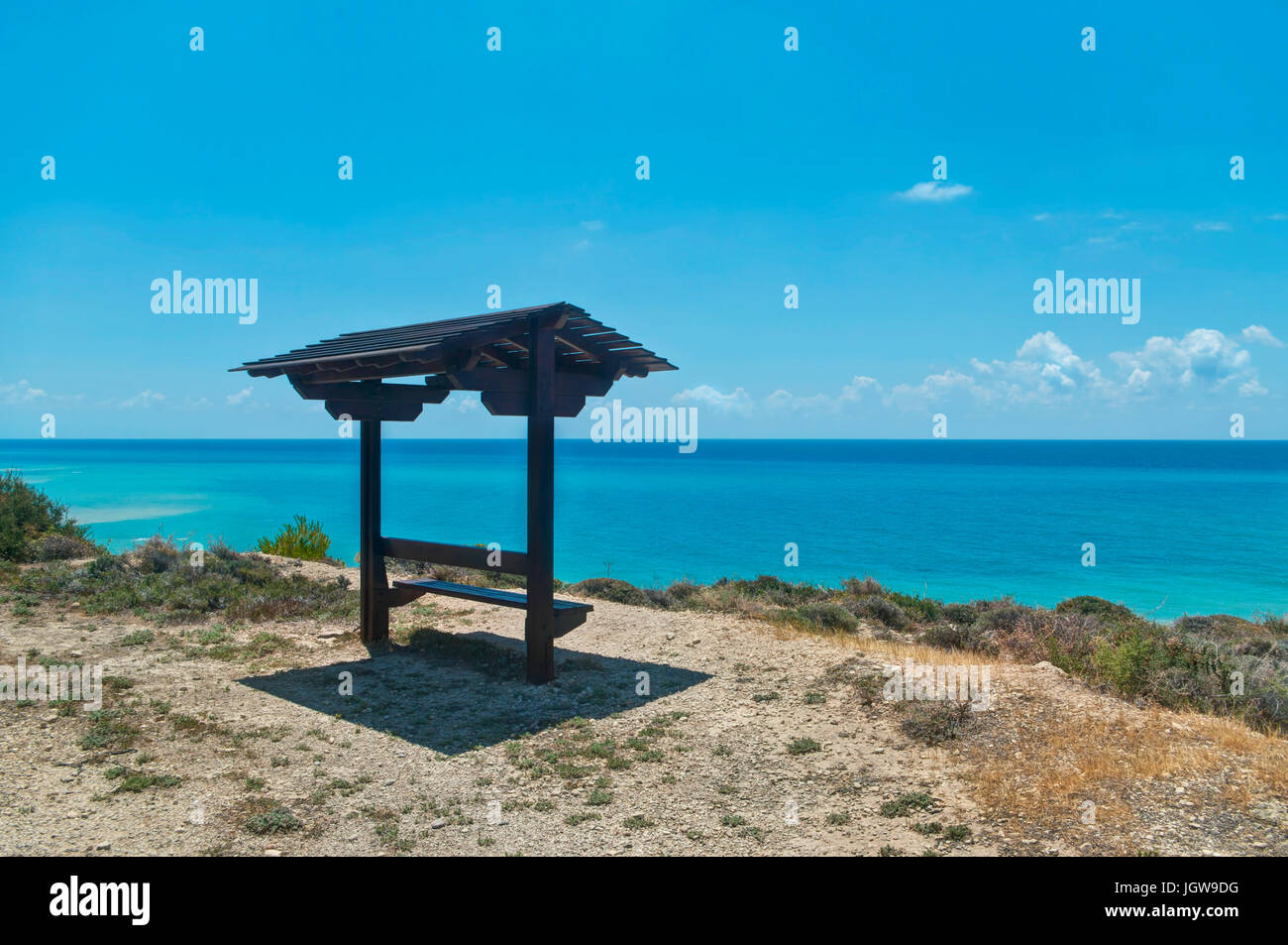 bench with roof on top of hill Stock Photo - Alamy