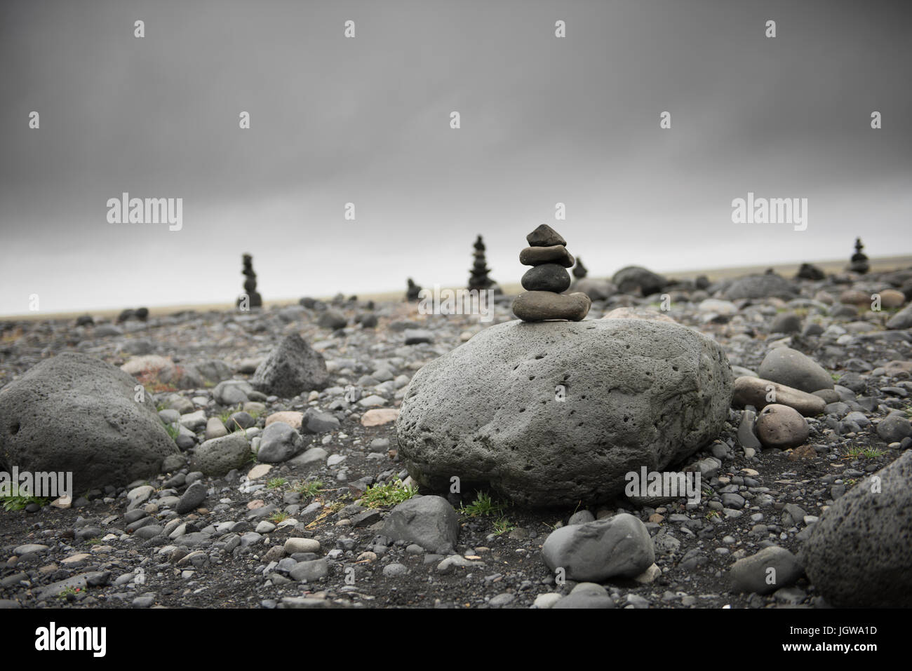 Stones in balance on top each other Stock Photo - Alamy