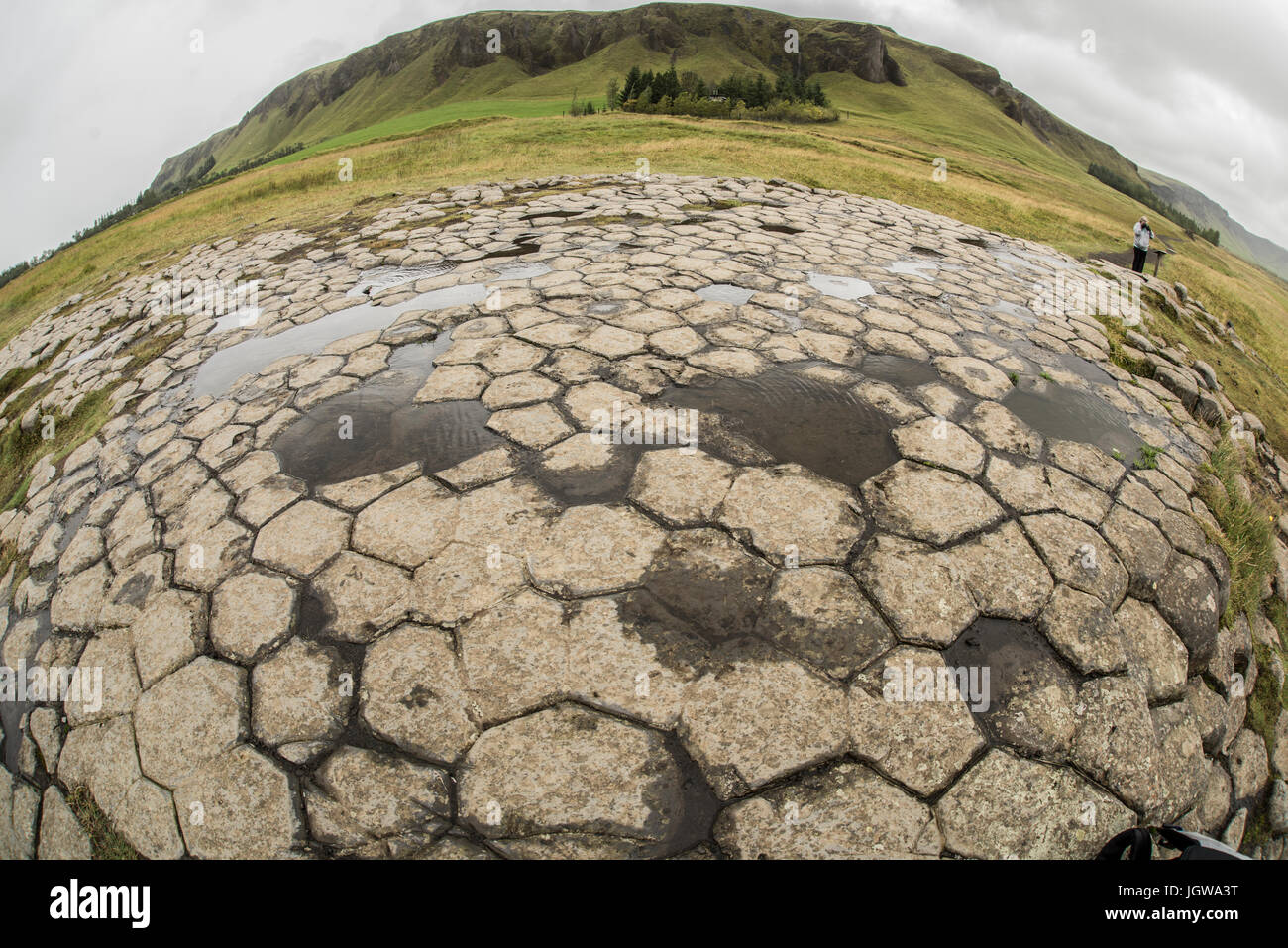 Hexagonal basalt rock columns in background hi-res stock photography ...