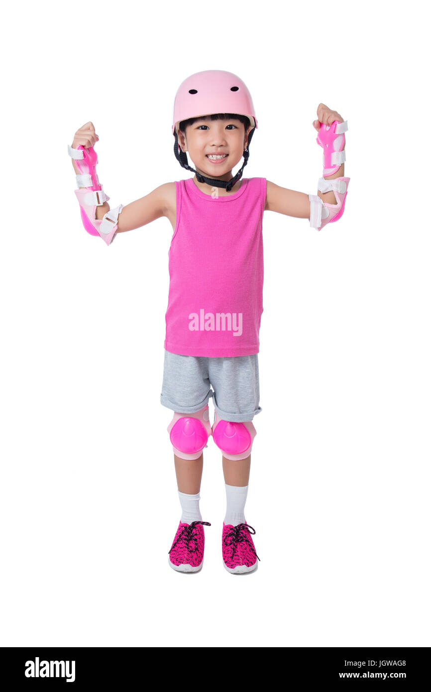 Asian little Chinese girl wearing protection kit in isolated white ...