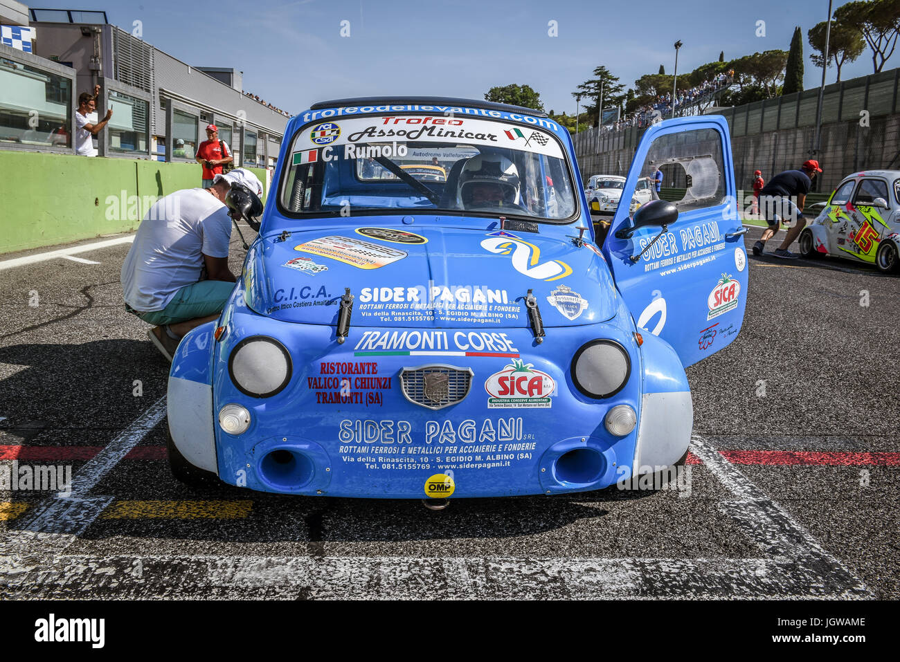 Italian Bicilindriche Cup, Blue Fiat 500 racing car on starting grid in ...